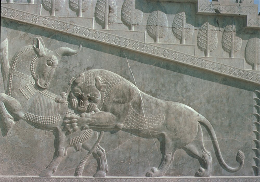 Relief on the East staircase of the Apadana depicting a lion fighting a ...
