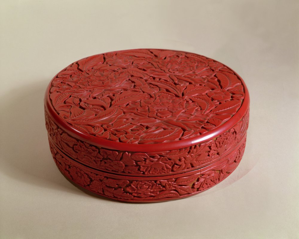 Red lacquer box decorated with peonies by Chinese School