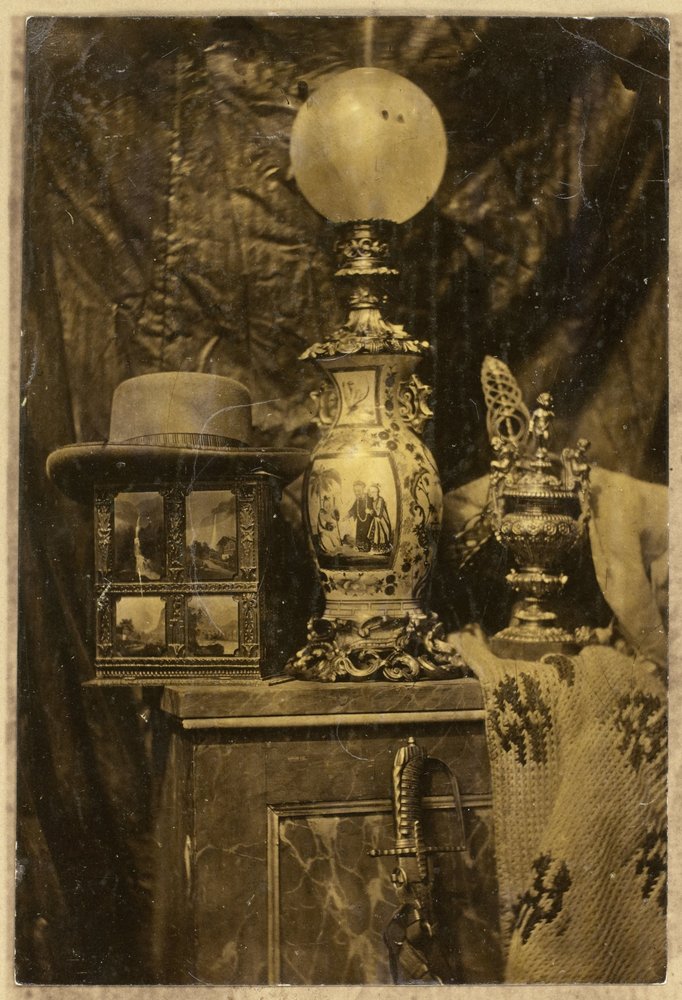 Still Life with Stereoscope, Hat, Chinese Vase, Silver Goblet, and Sword