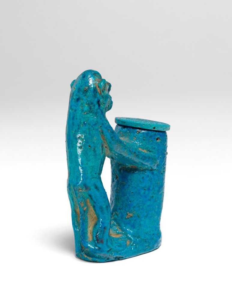 Kohl pot, in the form of a monkey faience