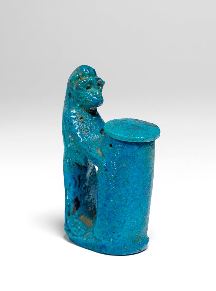 Kohl pot, in the form of a monkey faience