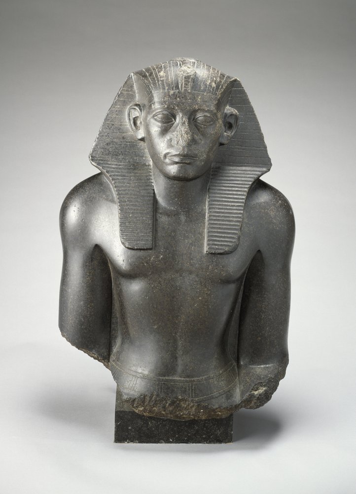 Male head and torso of a sitting statue of King Sesostris III of Egypt