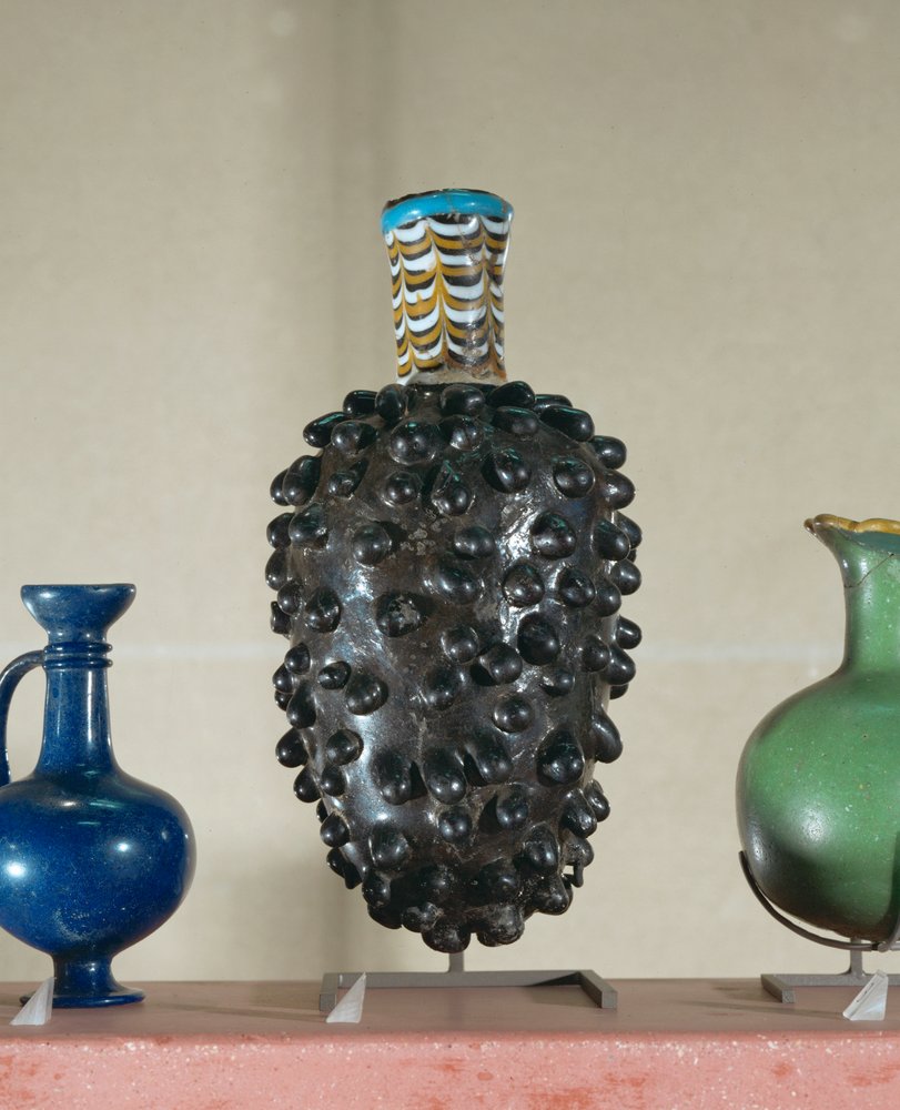 Flask made by immersing a matrix in molten glass