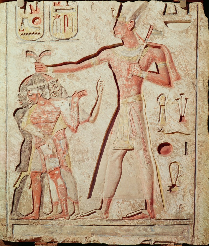 Ramses strikes his enemies by Egyptian 19th Dynasty