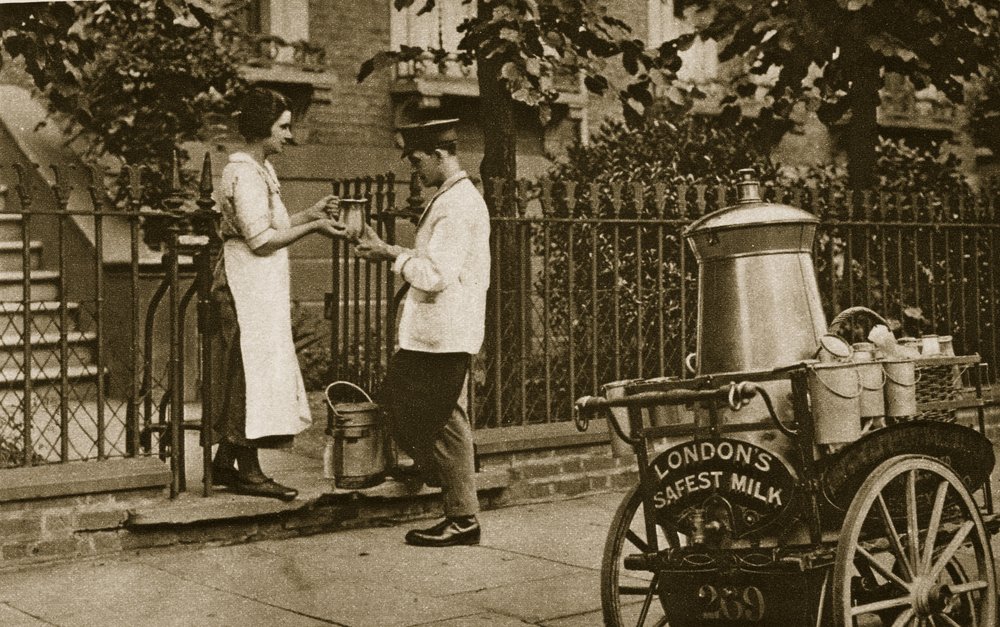 A North London Milkman and his three-wheeled trolley