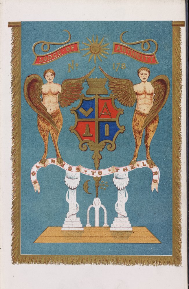 Masonic lodge emblem showing coat of arms with angels