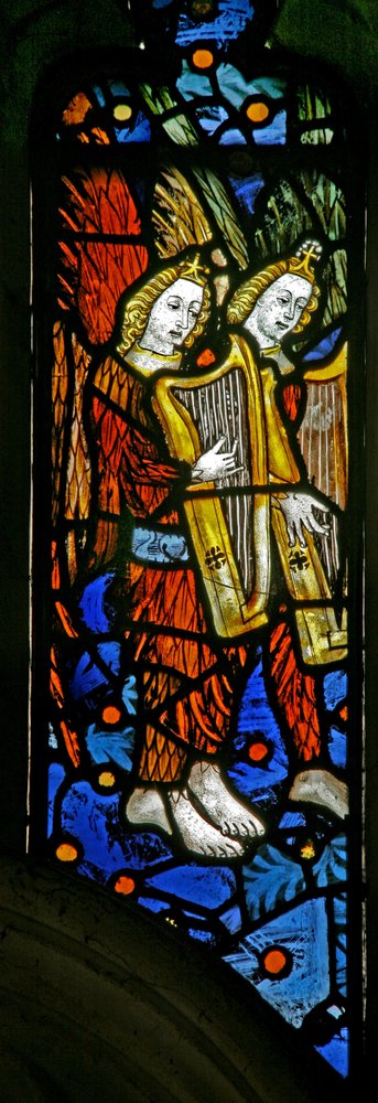Window depicting musician angels with harps