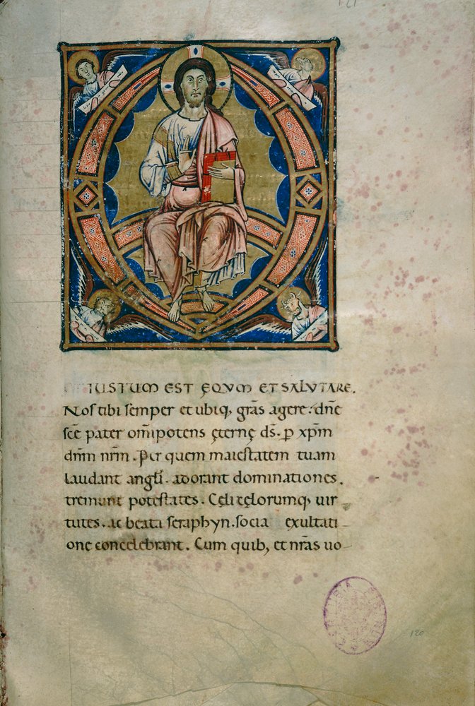 Illuminated page with Christ in Majesty and symbols of the evangelists ...