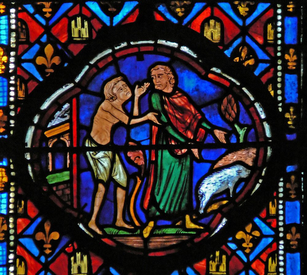 Window Ew-L depicting a scene from the Prodigal Son story: having spent ...