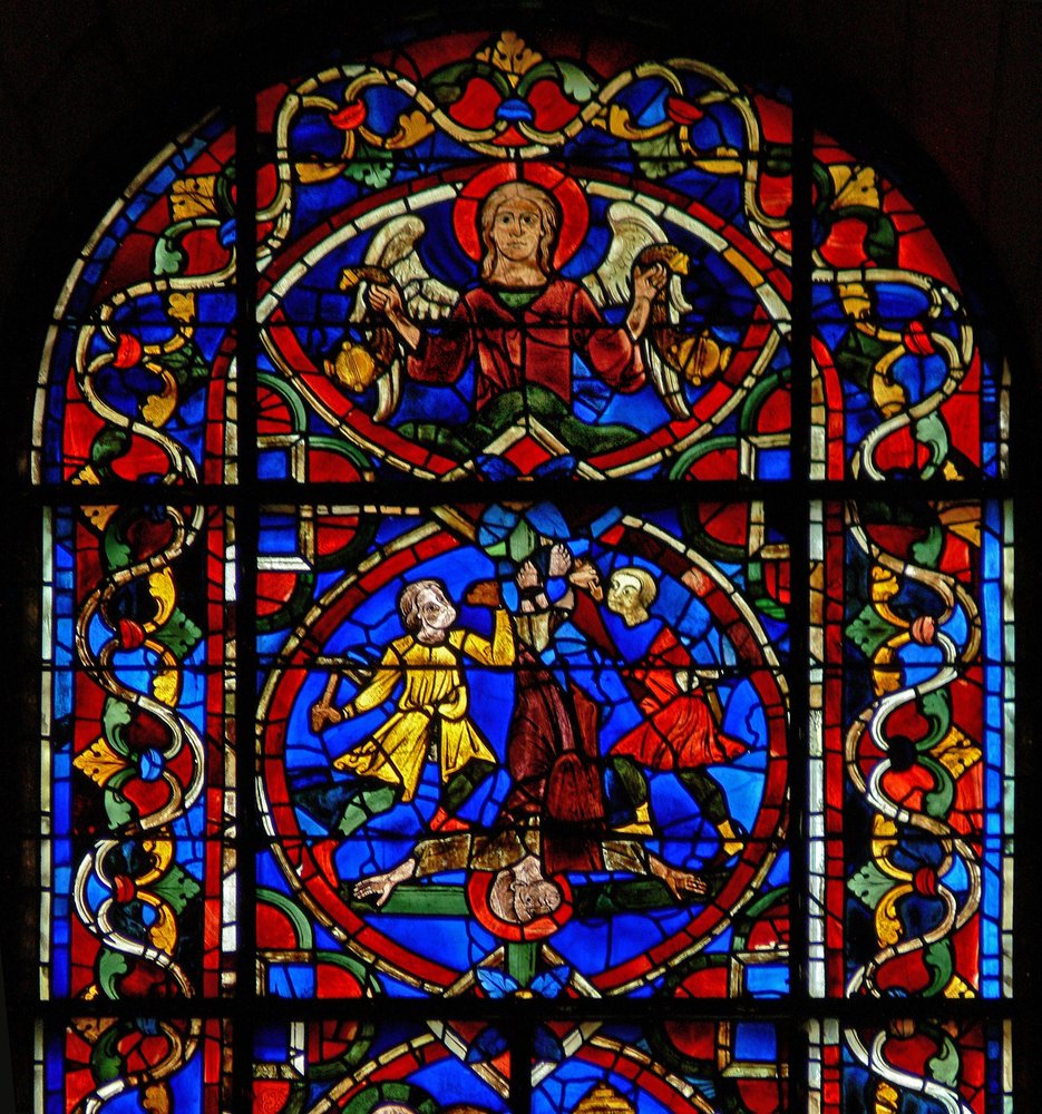 Window w107a depicting an angel and the crucifixion of St Peter