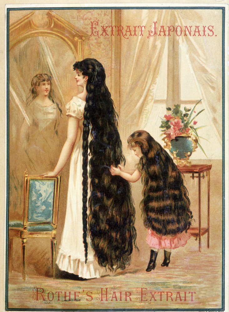 Young woman and her little girl with both very long and abundant hair ...