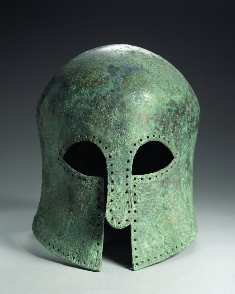Corinthian helmet, late 7th century BC by Greek