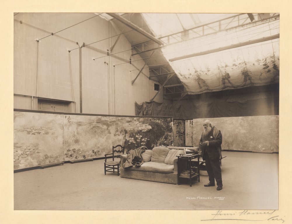 Claude Monet in front of his paintings 'The Waterlilies', in his studio ...