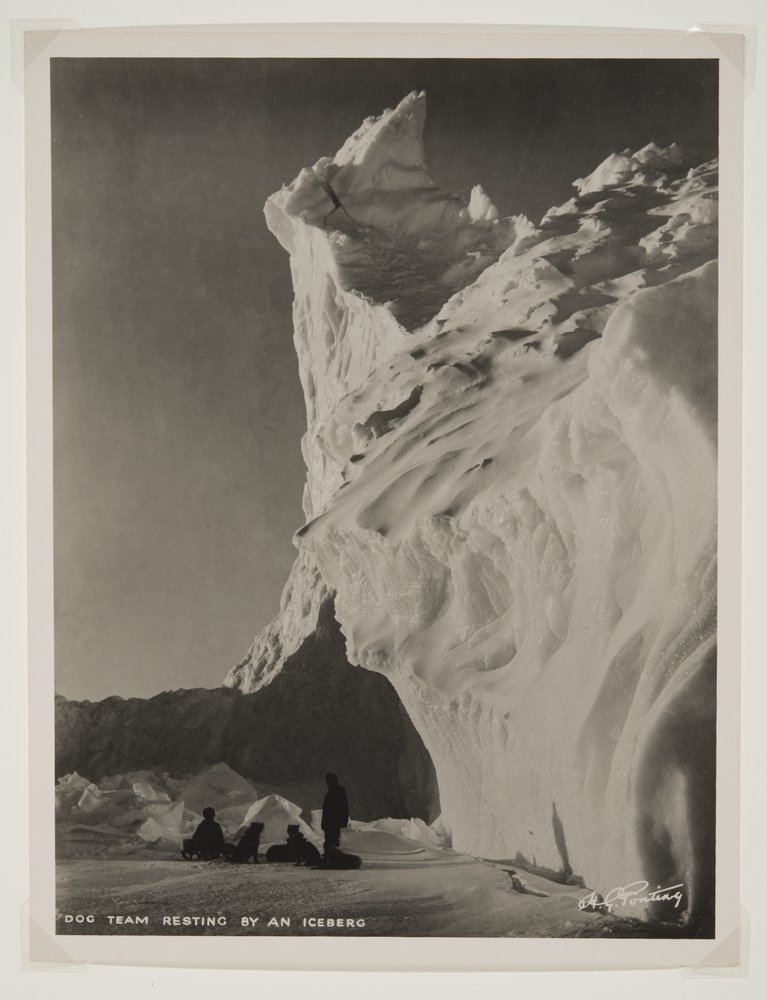 Dog Team Resting by an Iceberg by Herbert Ponting