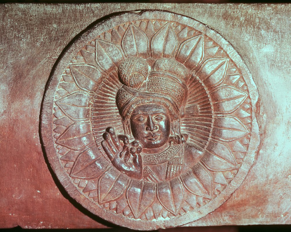 Relief depicting a lotus blossom with the head of a man, from a ...