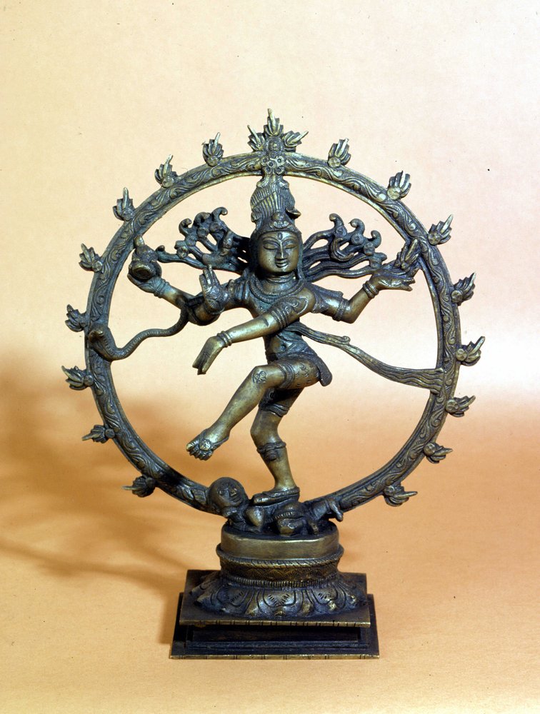 Shiva dancing in the circle of fire and crushing the spirit of evil ...