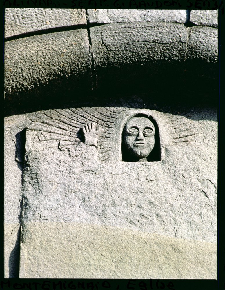 Relief depicting the head and face of a man, possibly God the Father ...