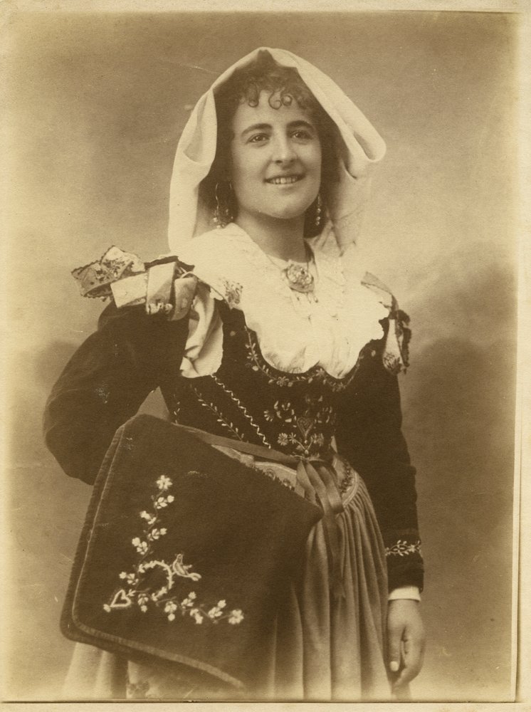 Young woman wearing traditional dress and headpiece, Abruzzo, Italy
