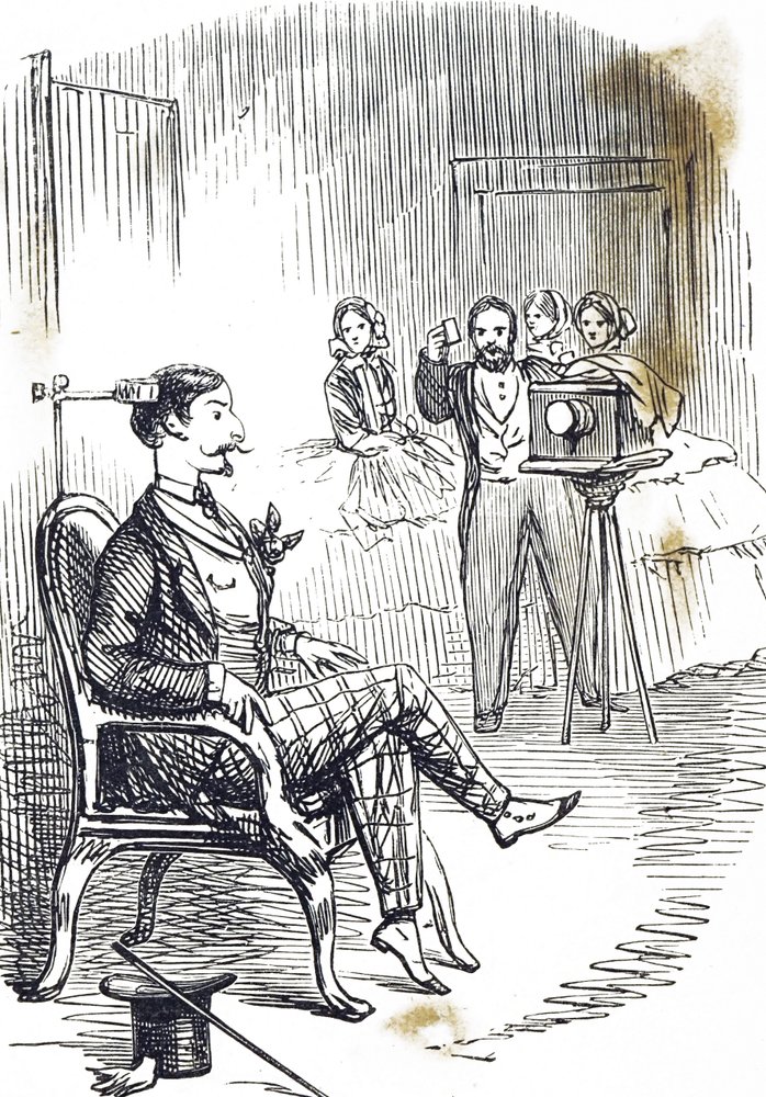 A head clamp being used to keep the photographer's subject still