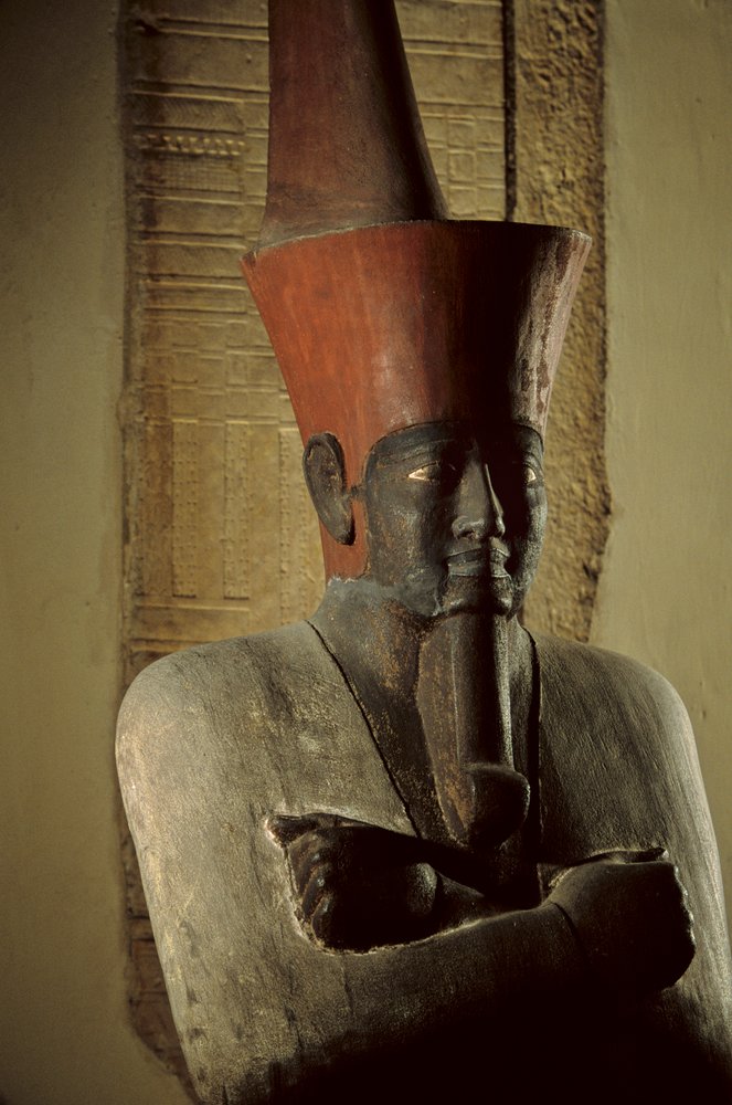Painted sandstone statue of Pharaoh Nebhepetre Mentuhotep II wearing ...