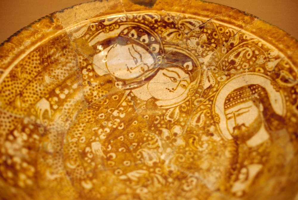Plate Decorated with Male and Female Faces, from Kashan, Iran