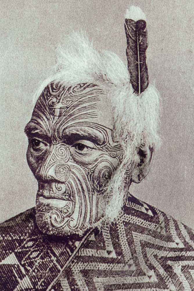 Maori warrior with moko face by New Zealander Photographer