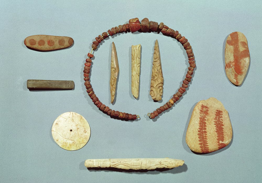 Three stones with red markings from Mas-d'Arvil