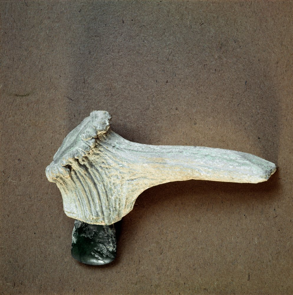 Green stone hatchet with deer horn handle from the cave of Pollera ...