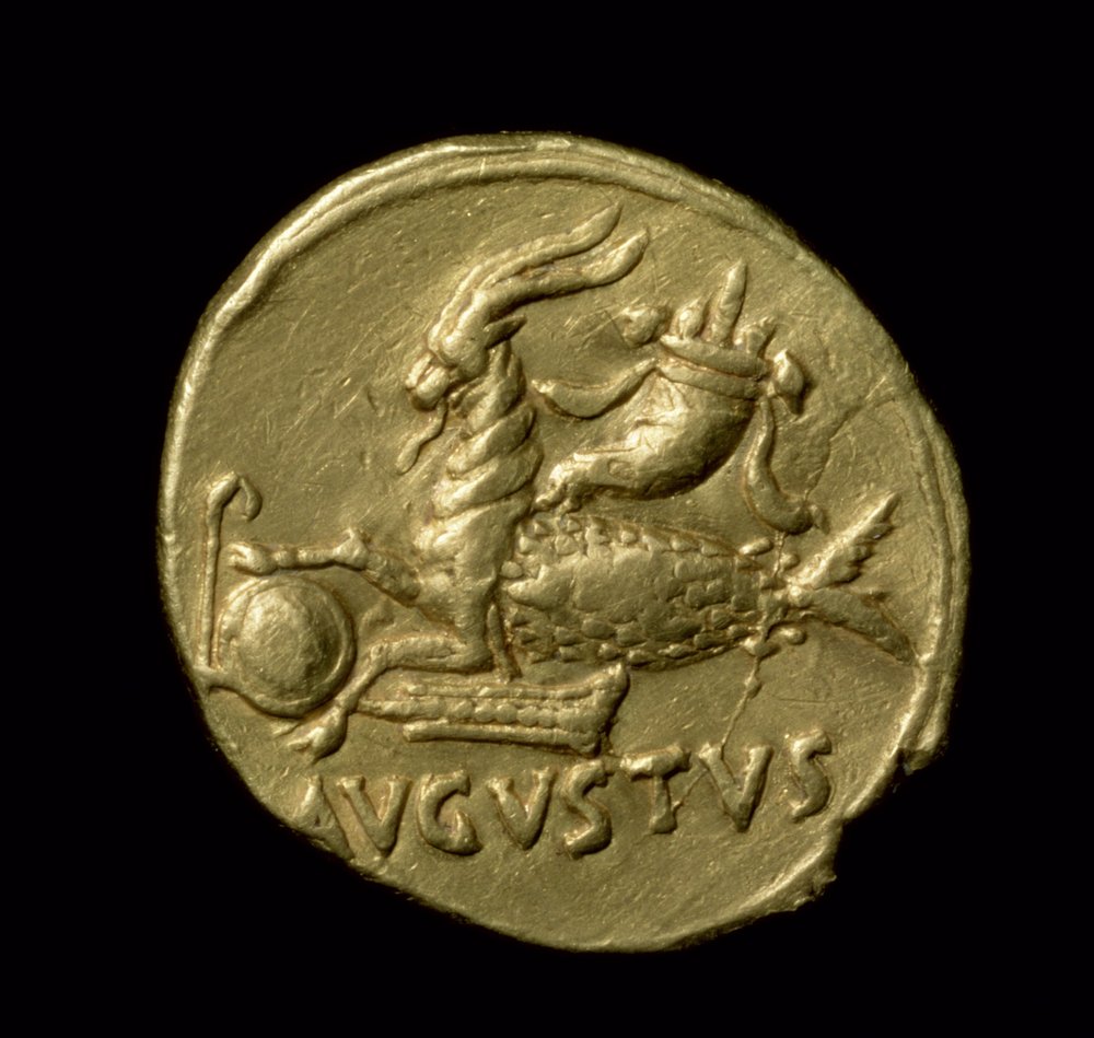 Reverse side of an aureus coin depicting a goat with a fish-tail and ...