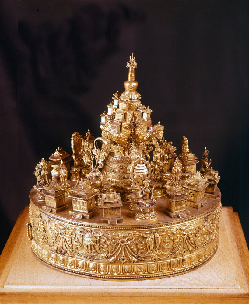 Tibetan Mandala: rare piece in sculpted gold bronze. The mandala is a ...