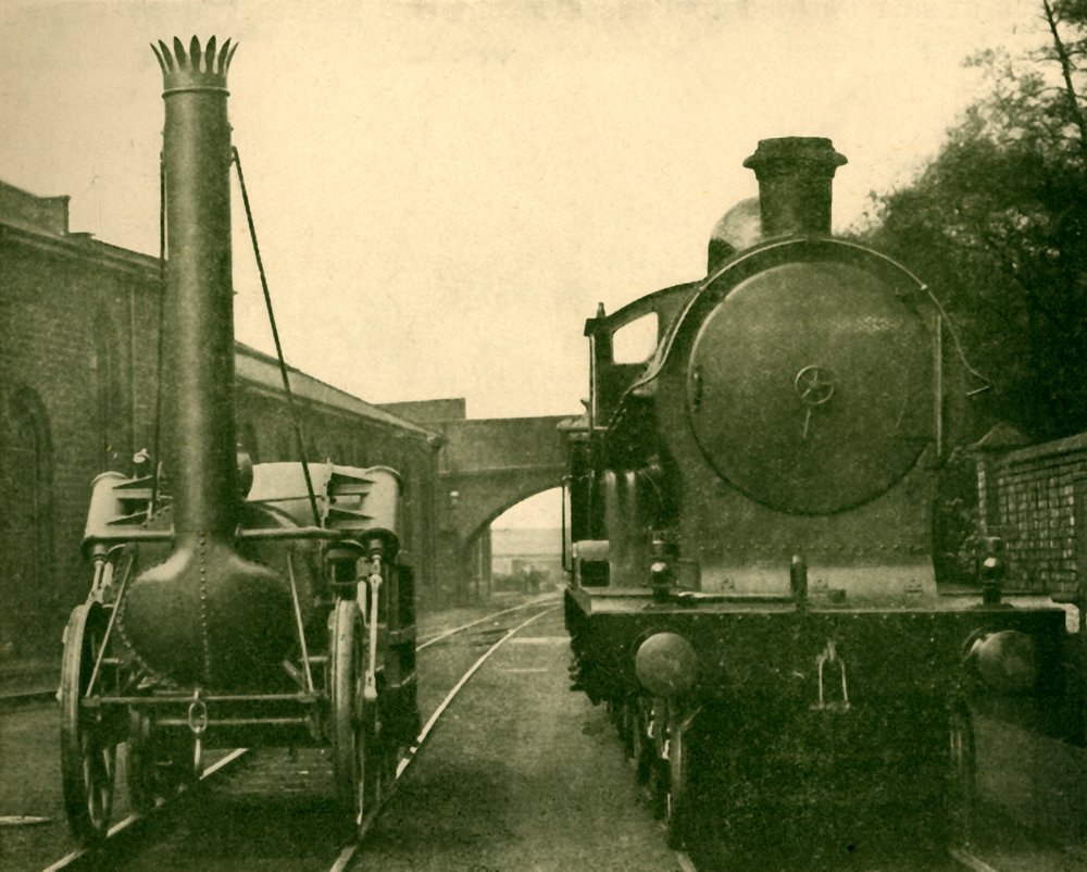 A Full Size Model of Stephenson's Rocket Alongside an Engine of the ...