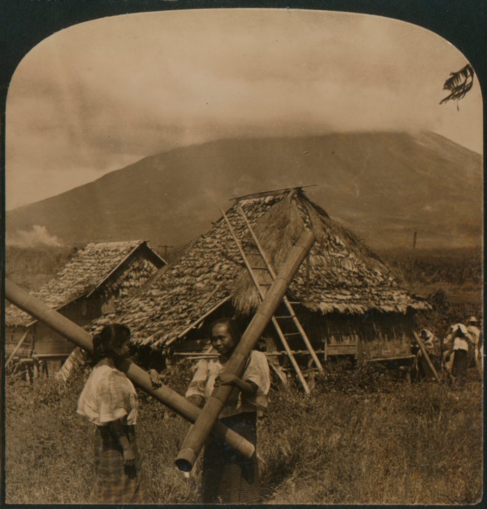 Native girls with their singular water vessels made of long shafts of ...