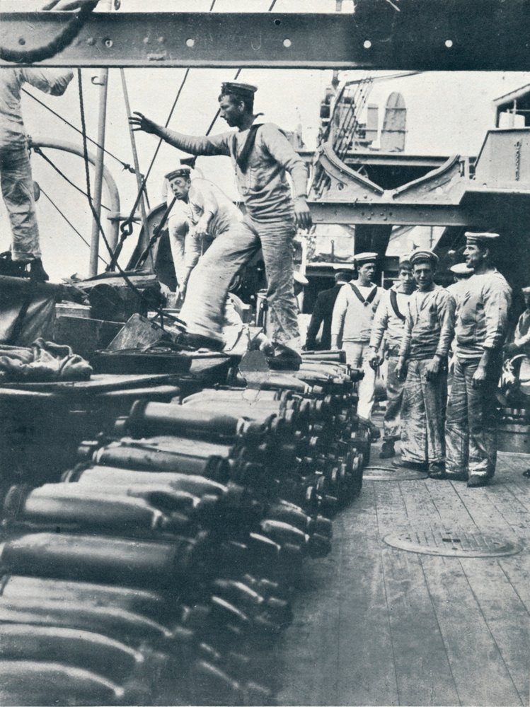 Receiving shells for the naval guns on the deck of a battleship