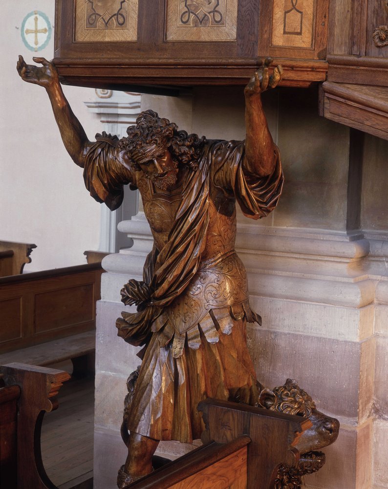Statue of Samson under the pulpit of the abbey church of Ebersmunster ...