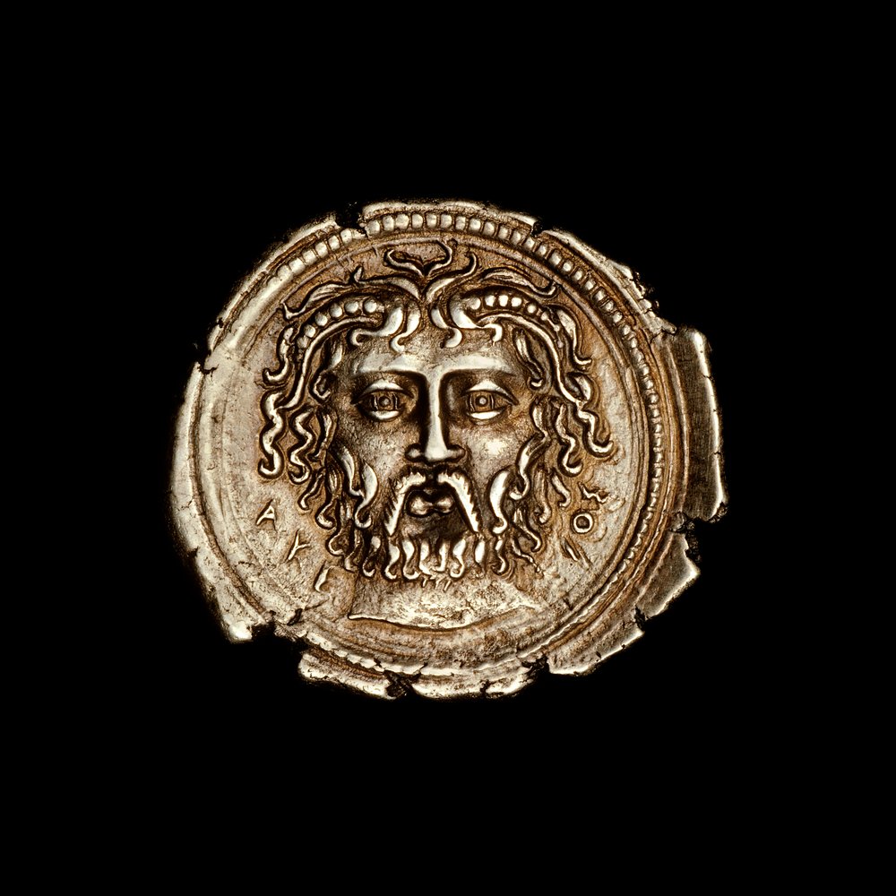 Ancient Greek Coin with Facing Head of Zeus, Circa 360BC