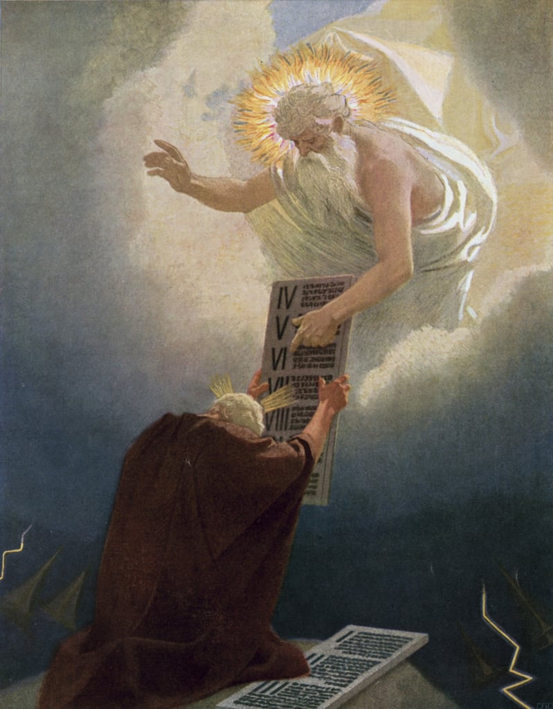 Moses receiving the Ten Commandments from God on Mount Sinai
