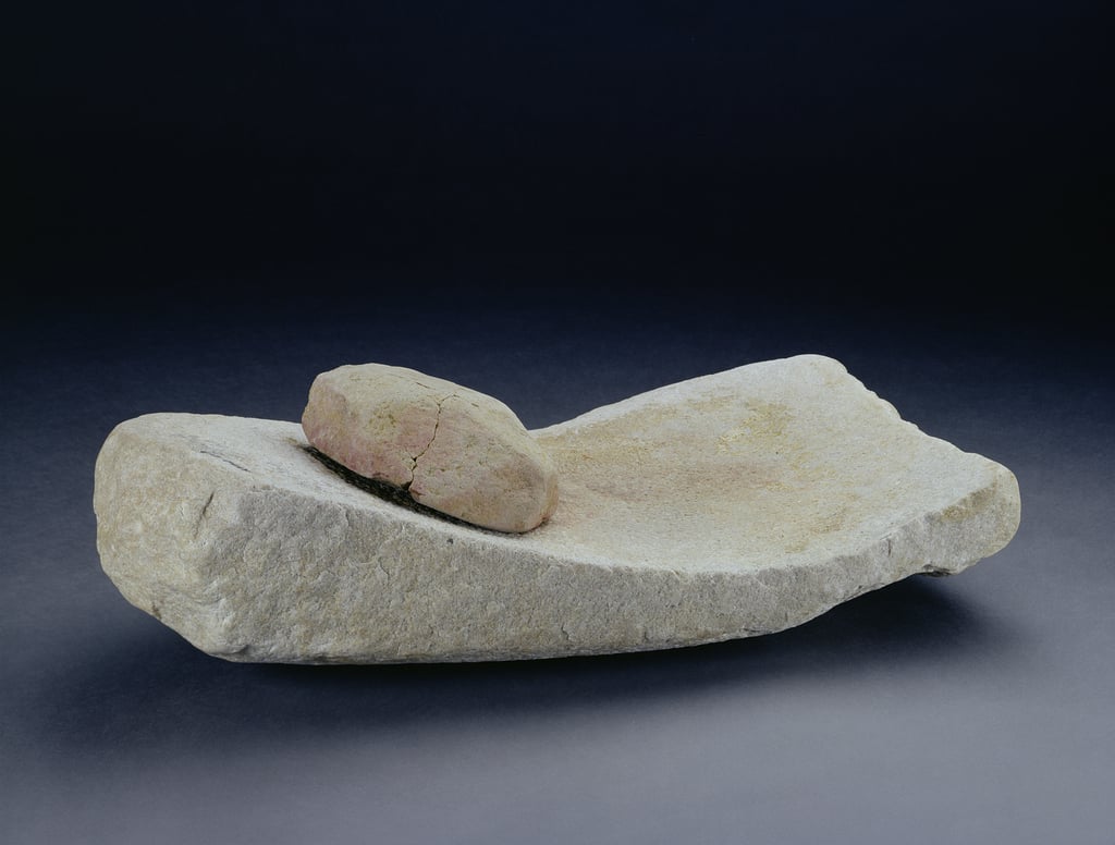 Saddle quern with grinding stone, from a farm at Mingies Ditch ...