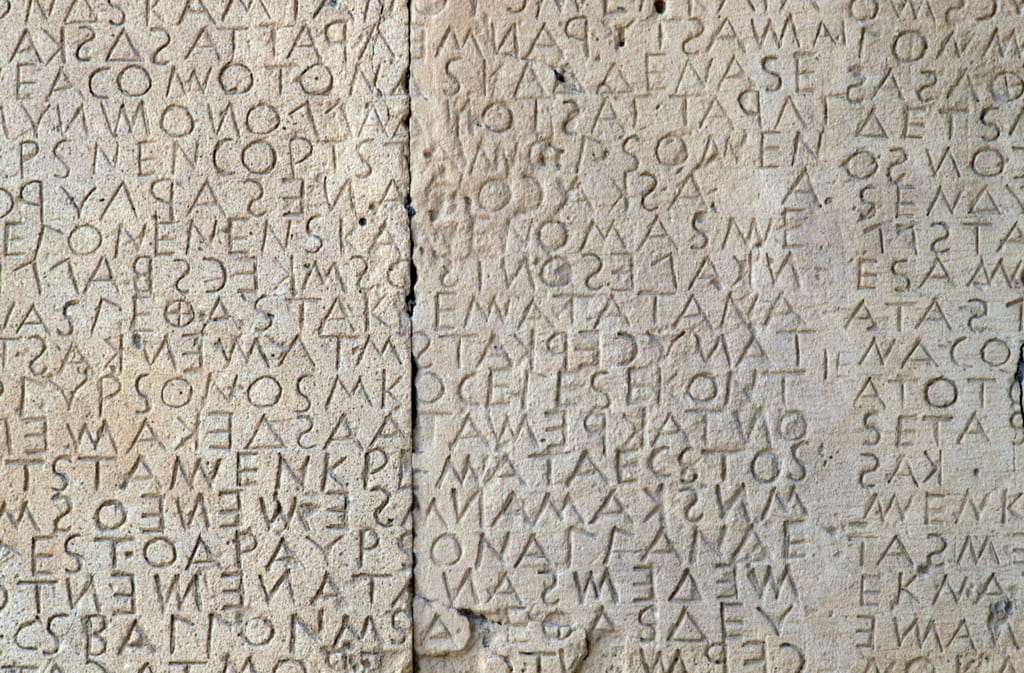 Law code of Gortyn, Doric inscriptions on stone slabs, Gortyn, Crete ...