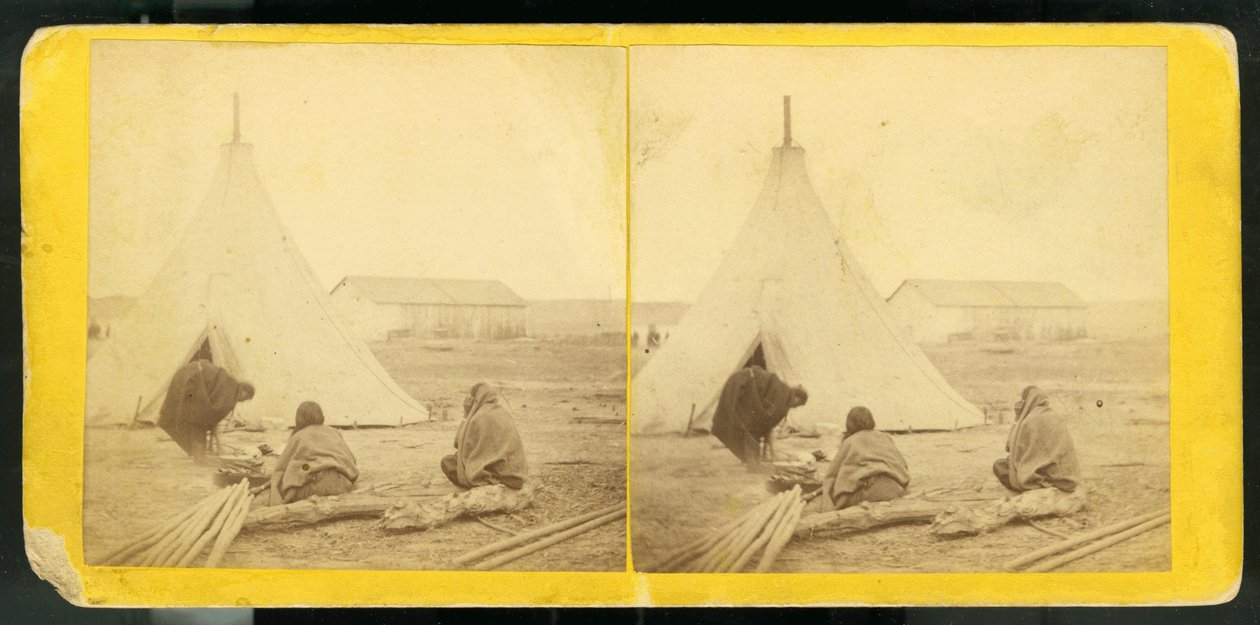 Squaws cooking in front of Spotted Tail's tent, 1868