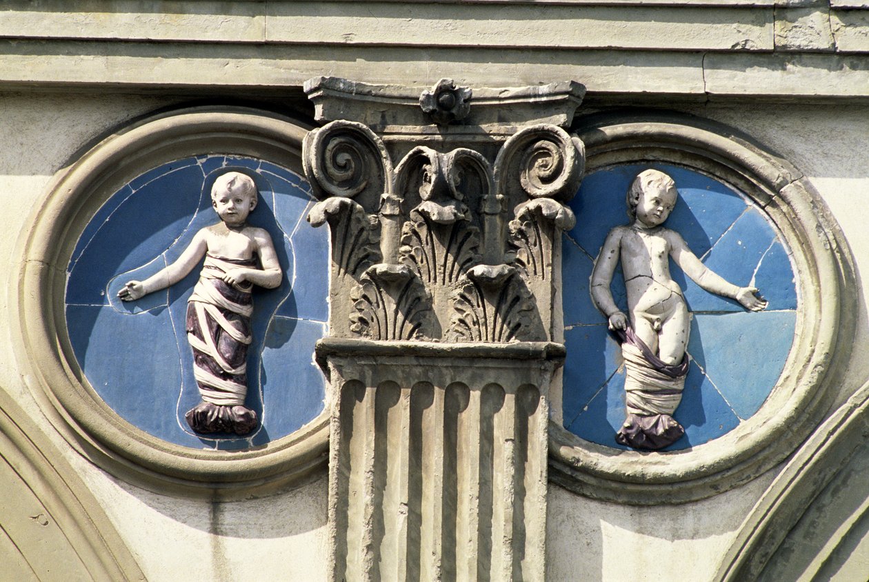 Roundel and pilaster from a spandrel of the loggia