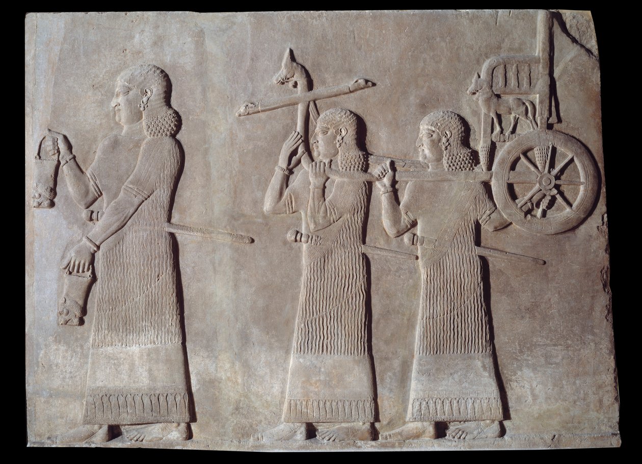 Court of the palace of King Sargon II of Assyria, servants carrying ...