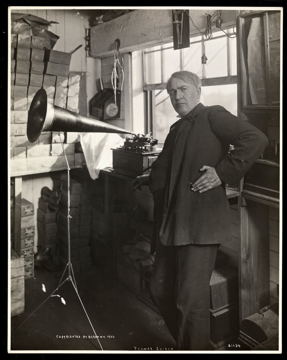 Thomas Edison Standing Next to a Phonograph in His Laboratory, 1920