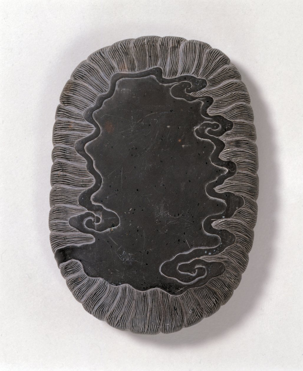 Inkstone carved with wave patterns, probably Ming dynasty