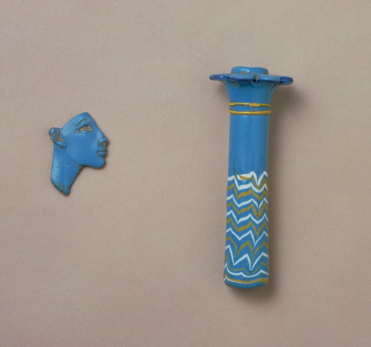 Palm column kohl flask and fragment of inlay of a royal head, from ...