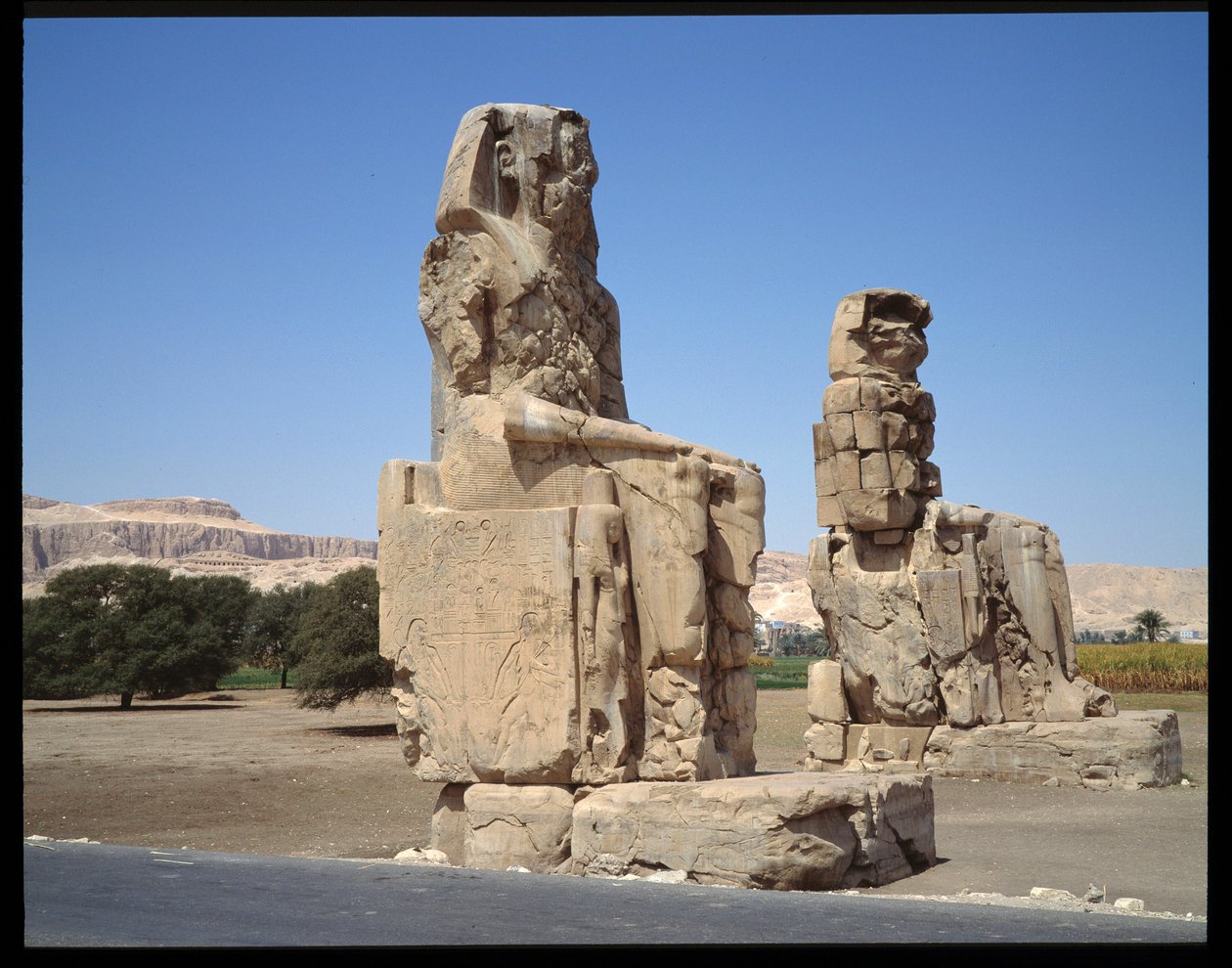 View of the Colossus of Memnon, Period of Amenophis III, New Empire