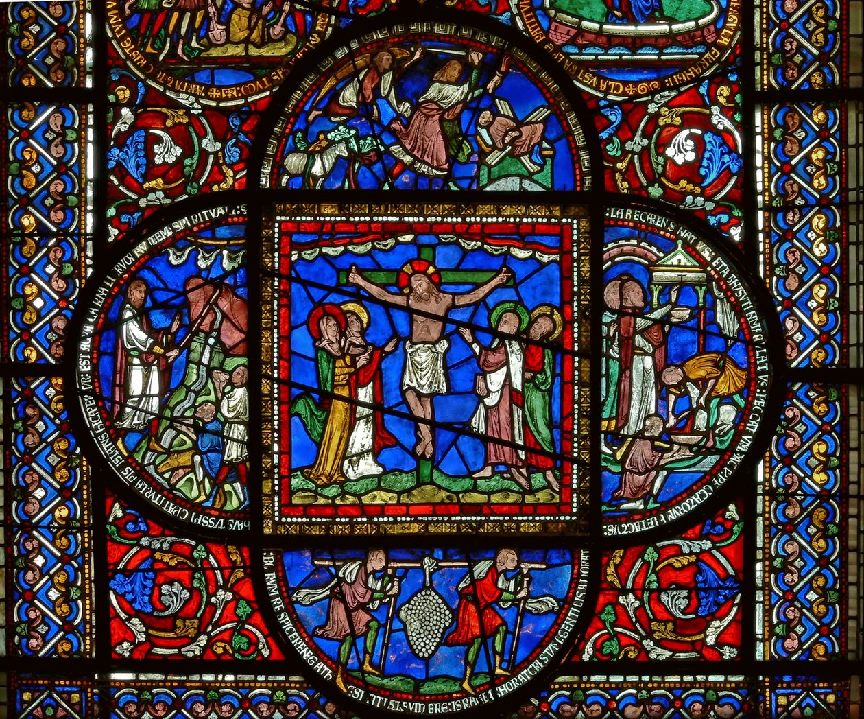 East window of the Trinity Chapel depicting the Crucifixion and four ...