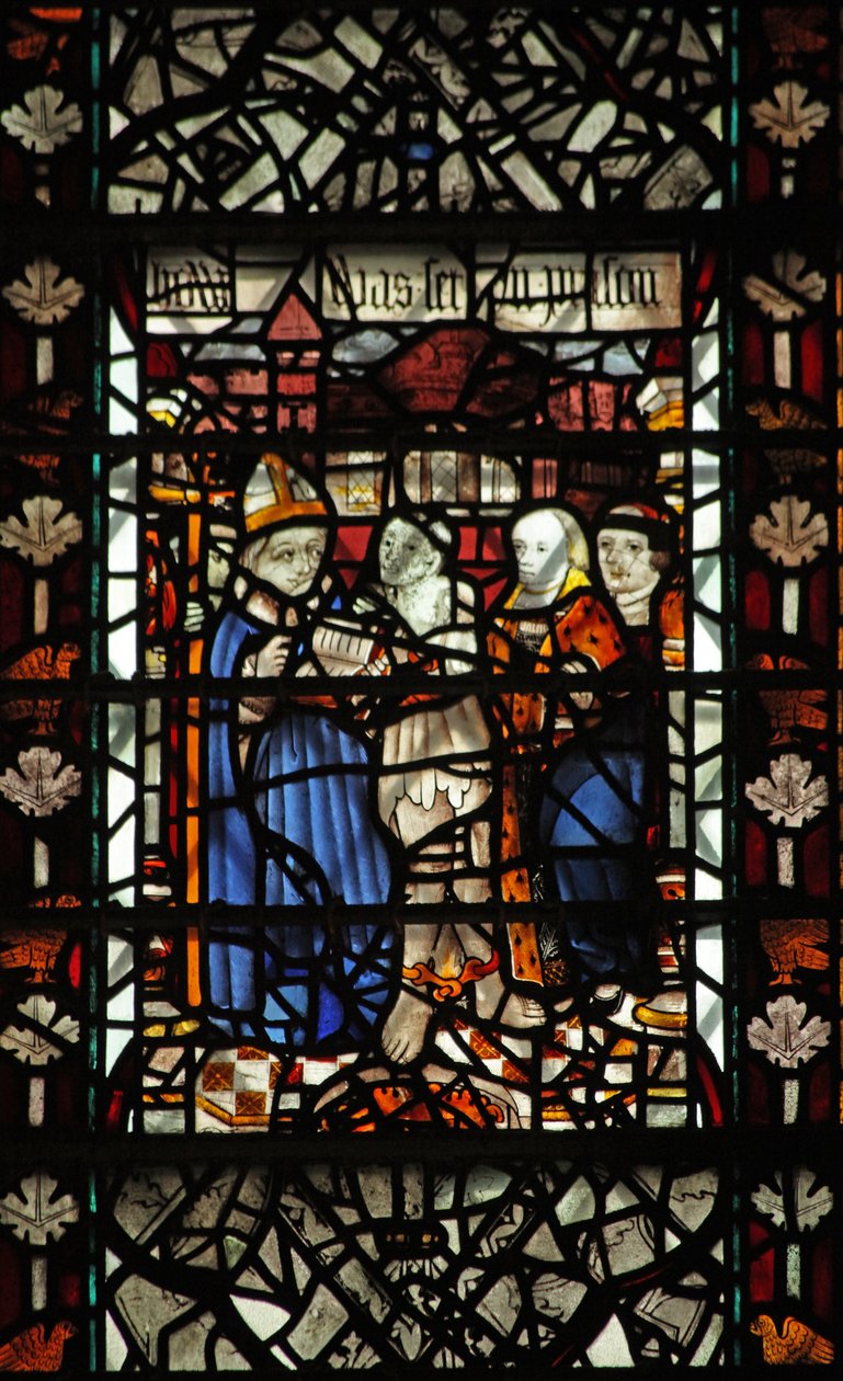 Window W58 depicting St Thomas Becket with a prisoner and 2 other figures