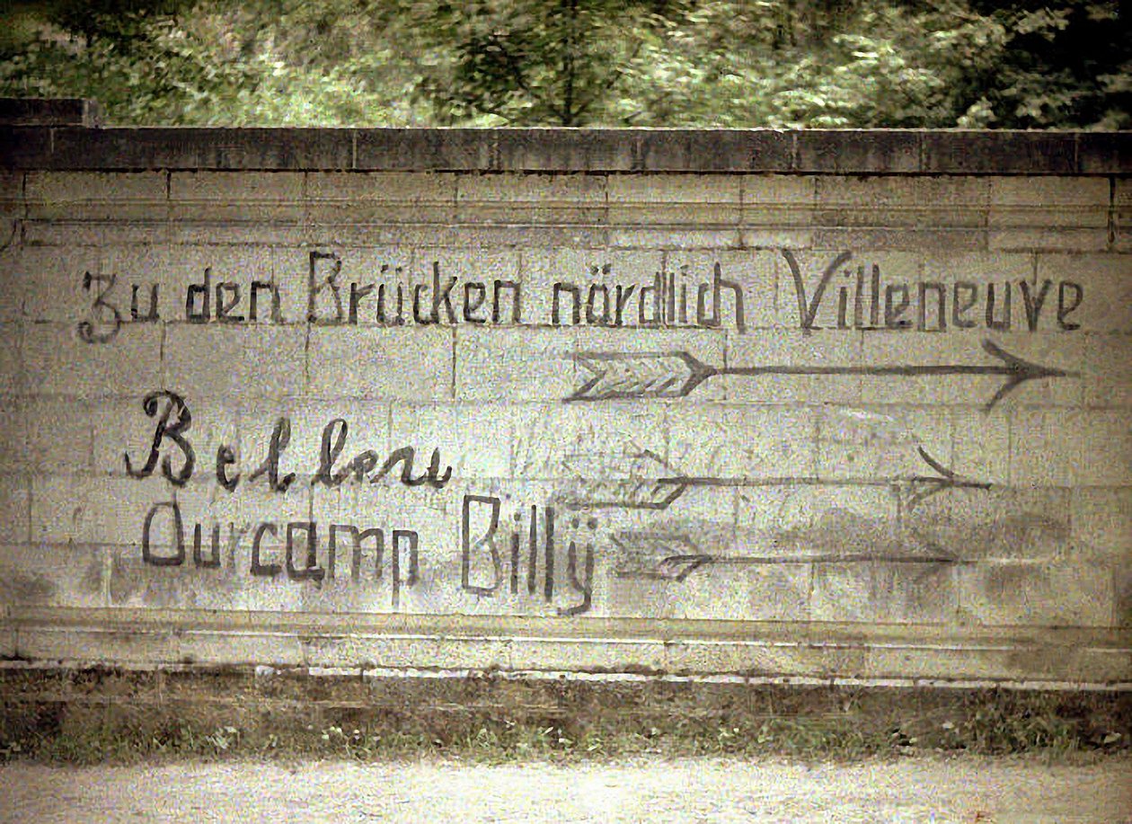 German and English inscriptions on a wall, Soissons, Aisne, France