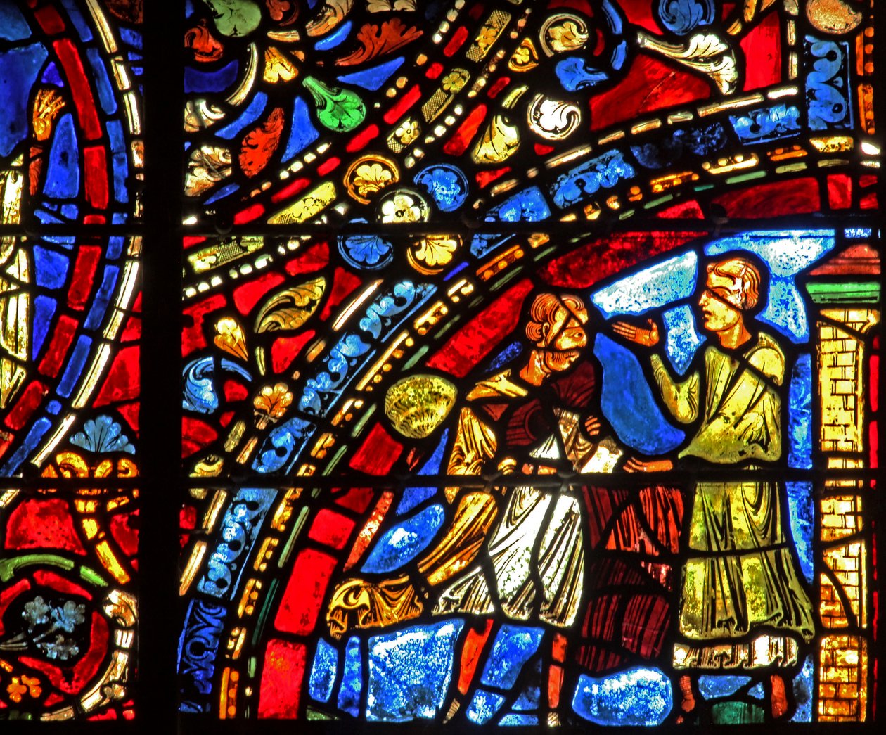 The Prodigal Son window: servant brings clothes