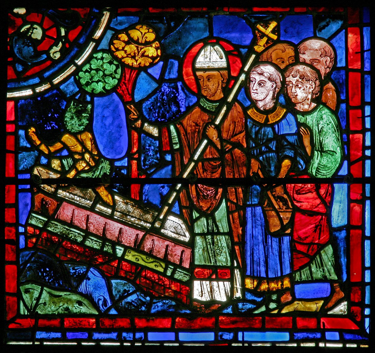 The St Martin window: the saint exorcises a demon from the tomb